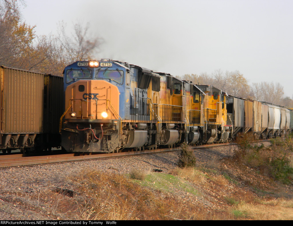 CSX 4713 Leads UP Train MASNL with a UP GP38-2 and a UPY MP15DC